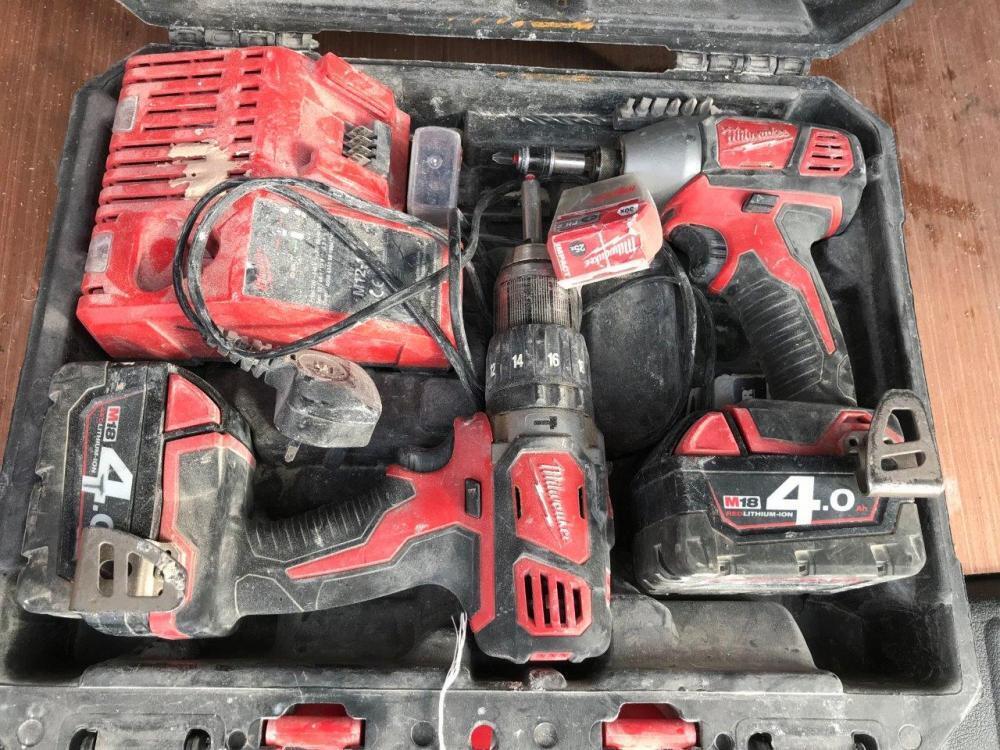 MILWAUKEE M18 BPD Cordless Combi Drill wth M18 BID Impact Drill, 2 x M18 4.0Ah Batteries and ...
